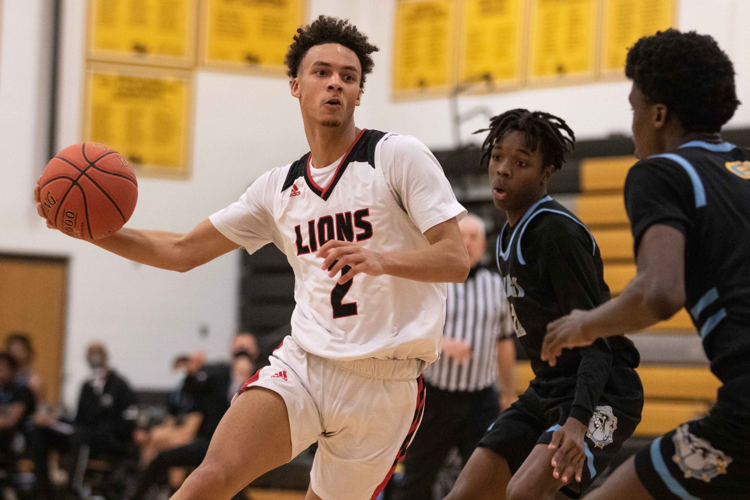 Lawrence boys basketball improves to 4-0 after earning 67-59 win over ...